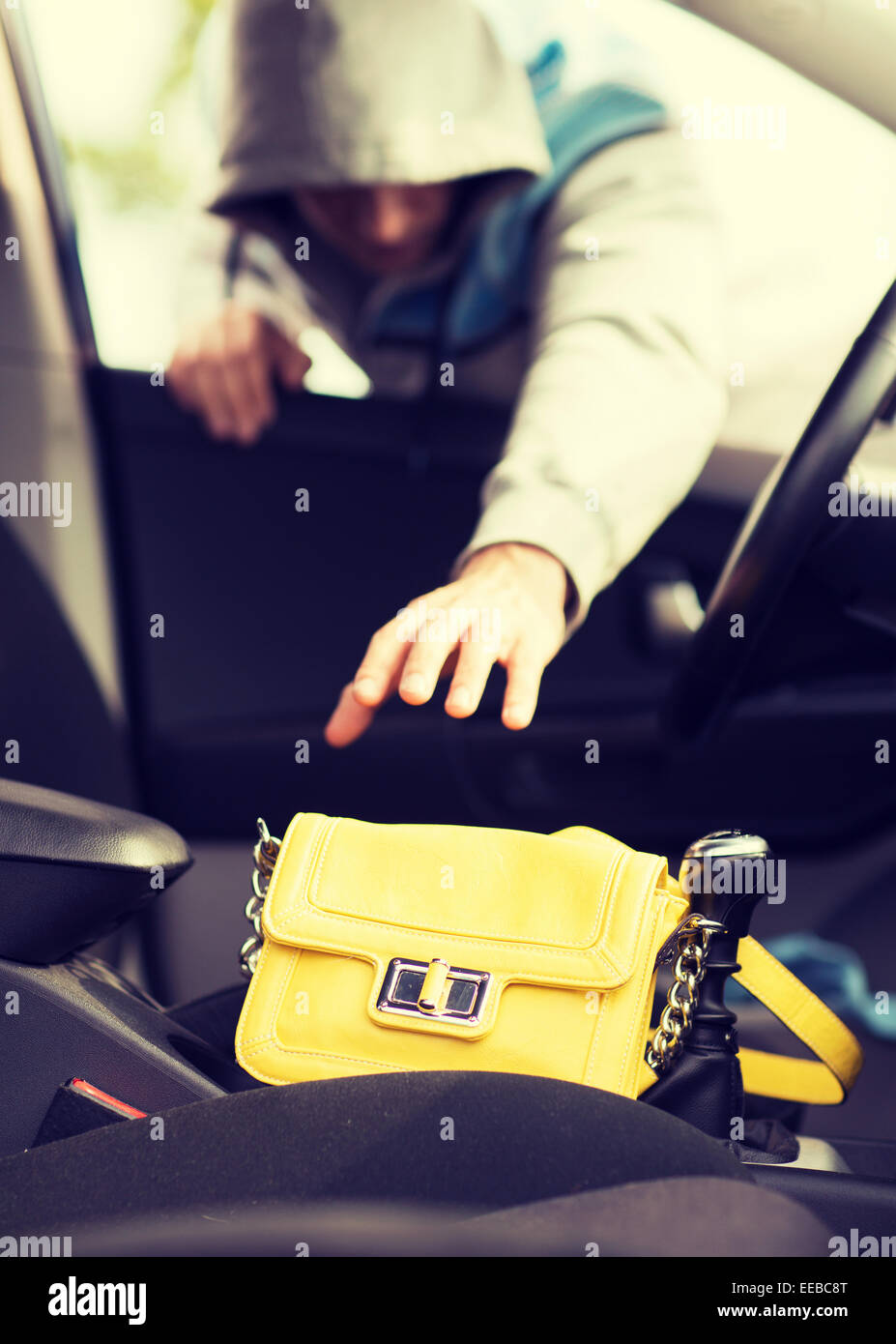 Thief stealing purse from handbag hi-res stock photography and images ...