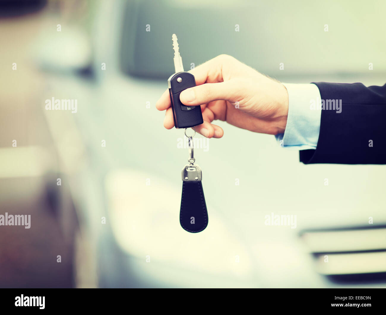man with car key outside Stock Photo - Alamy