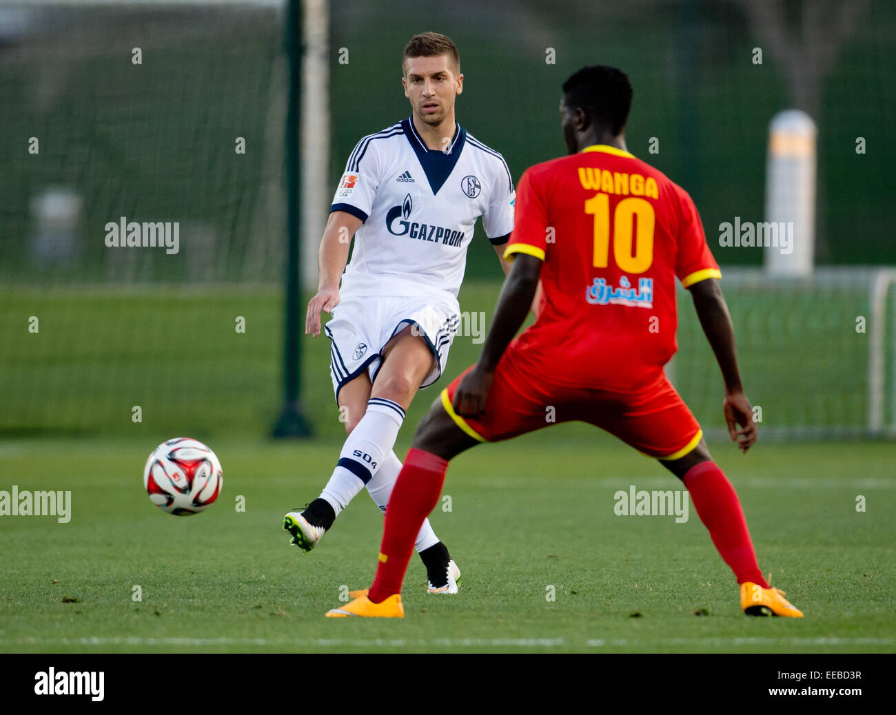 Doha, Qatar. 15th Jan, 2014. Matija Nastasic (R) of Schalke and Allan ...