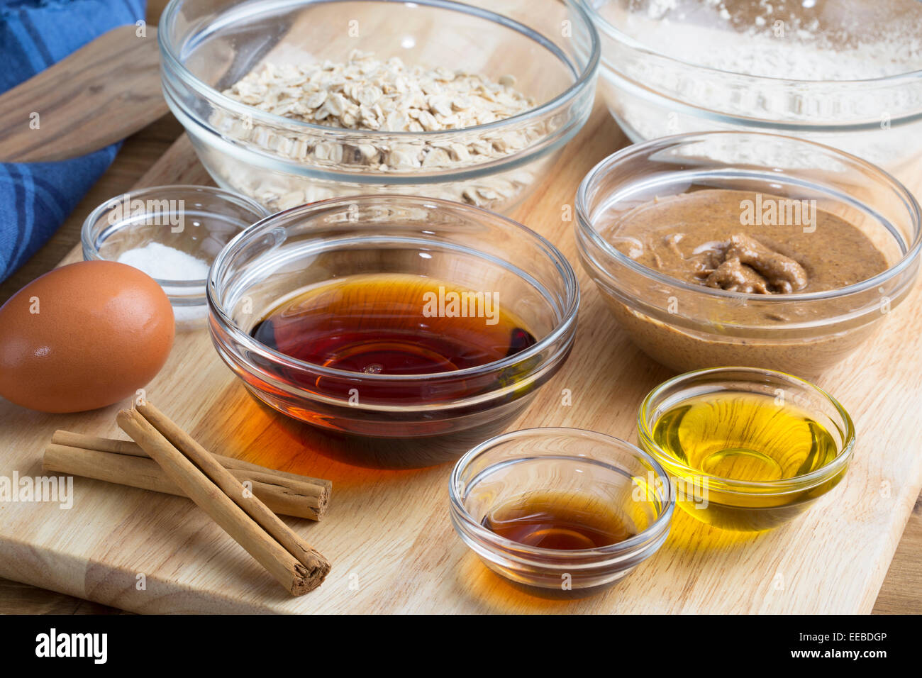 Dry and liquid ingredients for baking including an egg and cinnamon ...