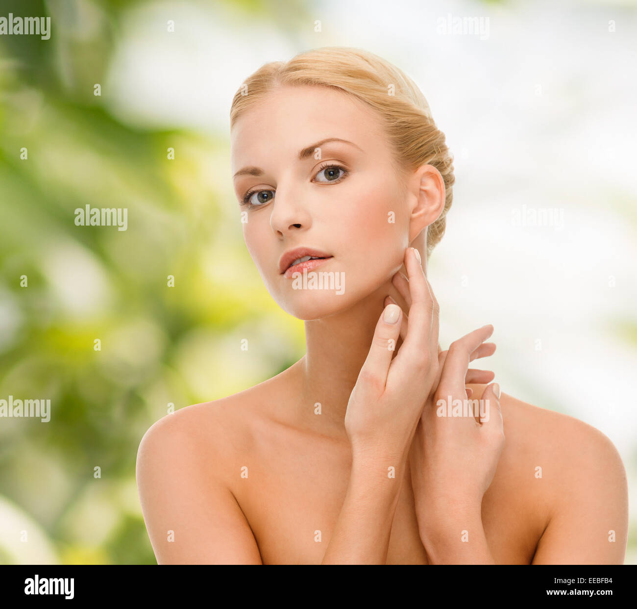 beautiful woman touching her face skin Stock Photo - Alamy