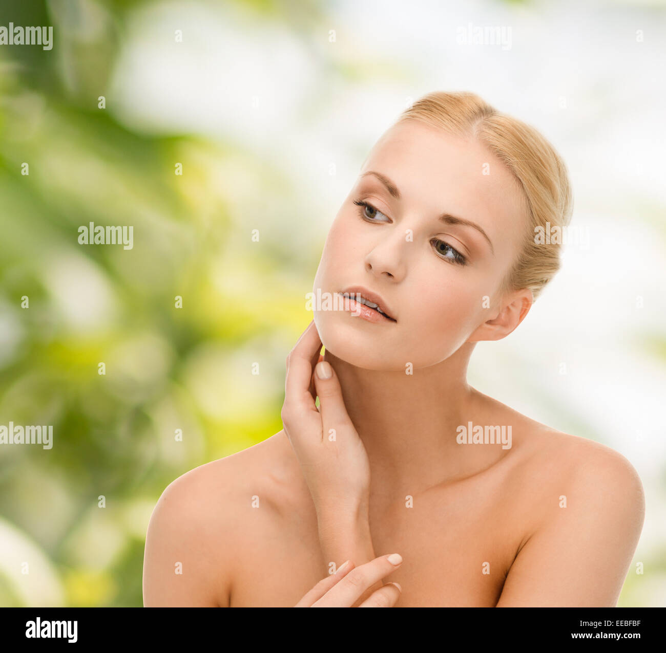 beautiful woman touching her face skin Stock Photo - Alamy