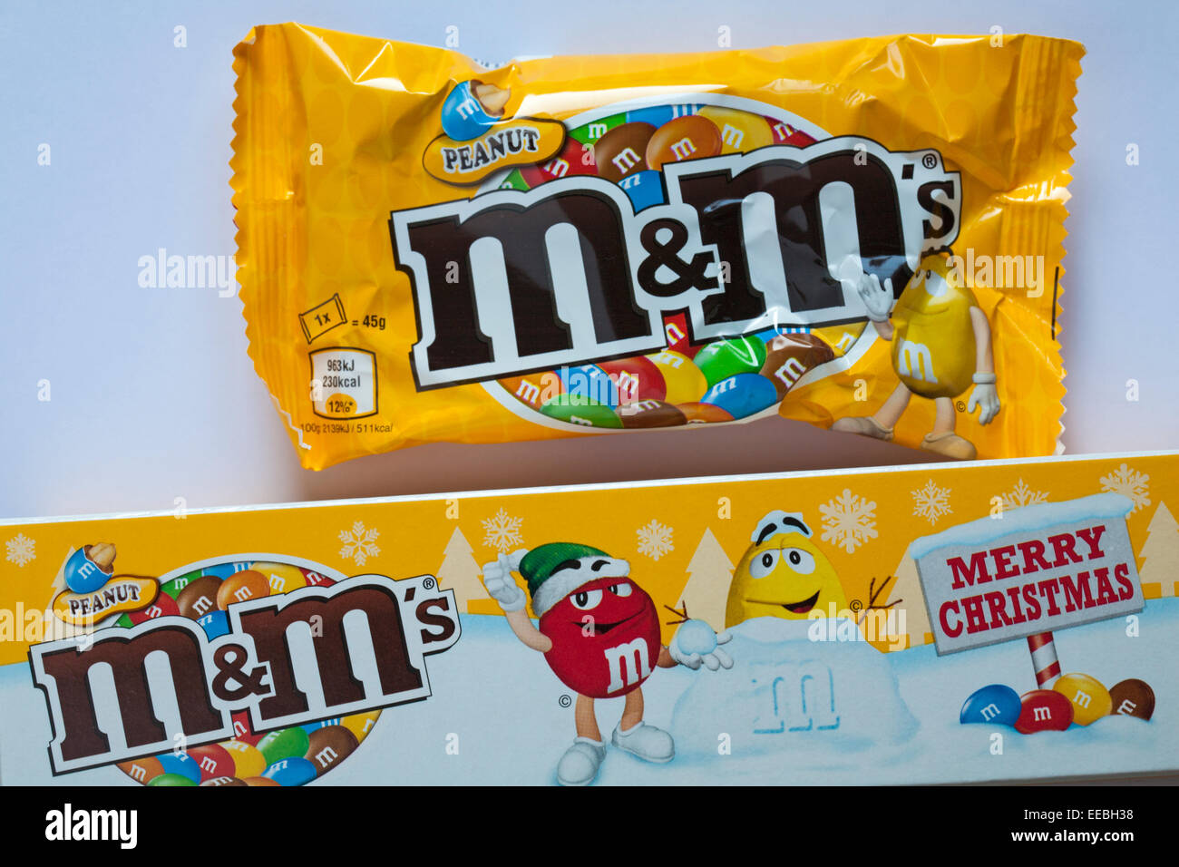 Box of Merry Christmas peanut M&M's with packet removed set on white ...
