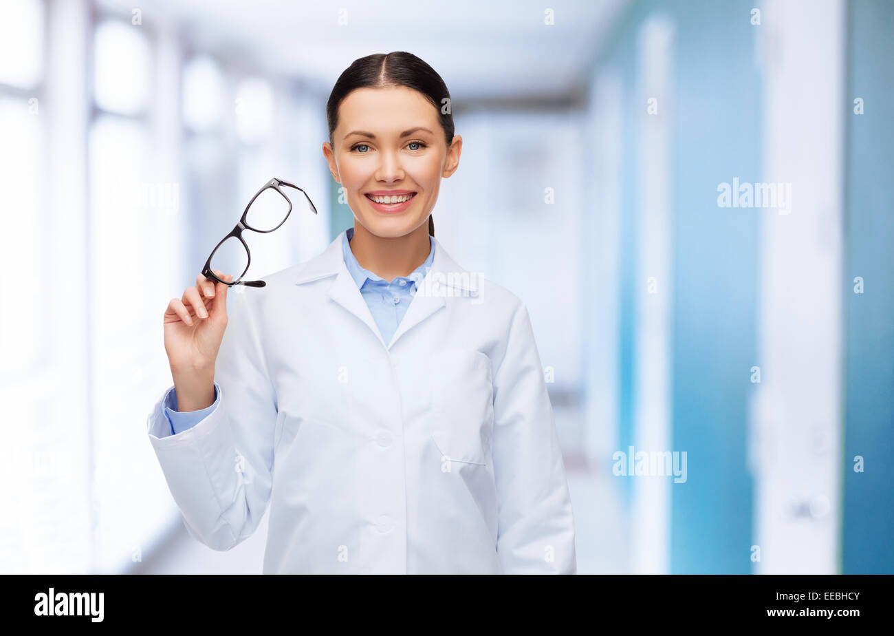 smiling female doctor without stethoscope Stock Photo - Alamy