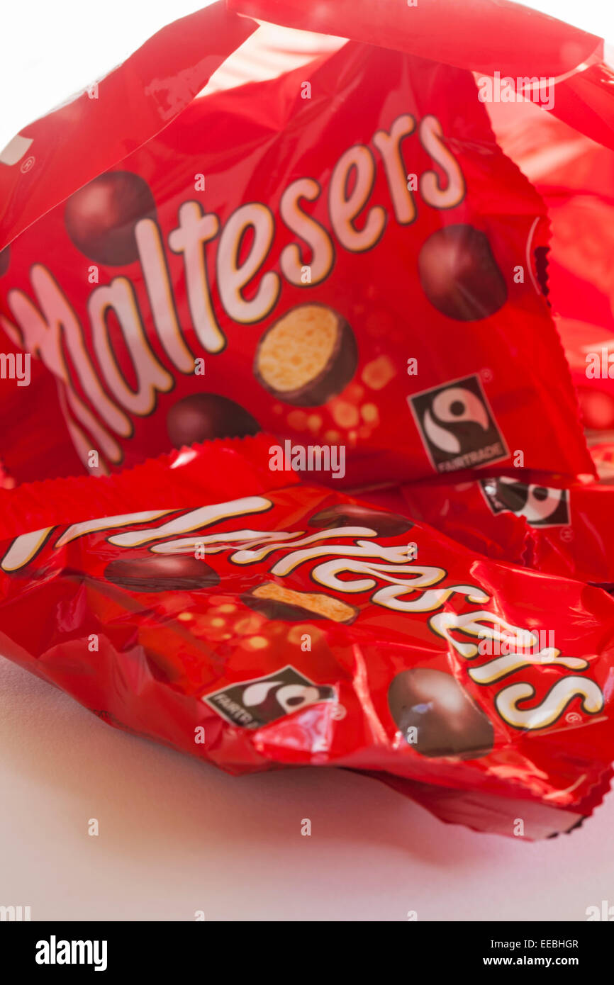 multipack bag of chocolate Maltesers set on white background ...