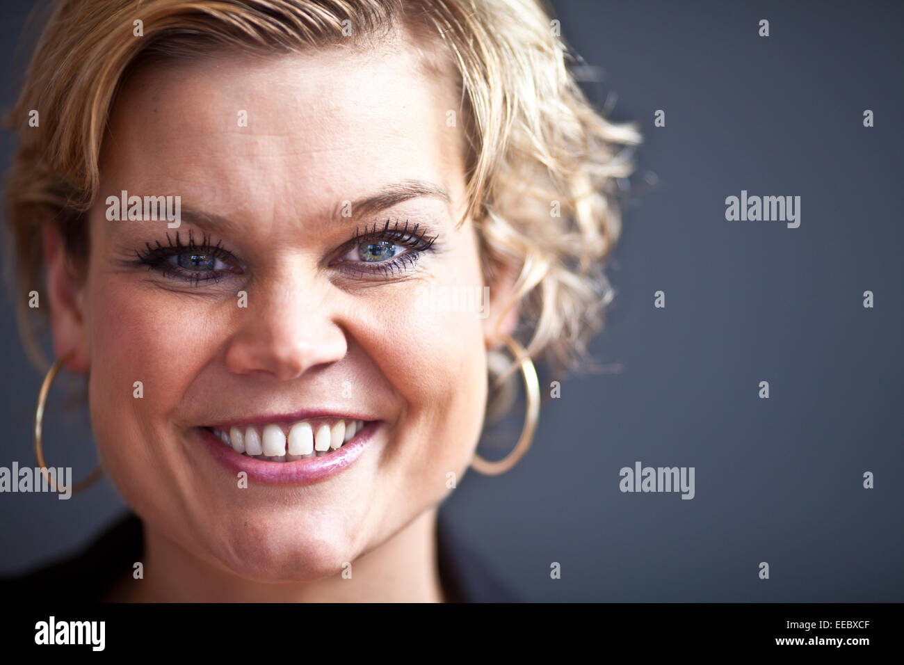Cute girl face closeup smiling Stock Photo - Alamy