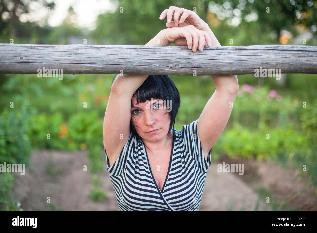 A young rural woman standing outdoors Stock Photo - Alamy