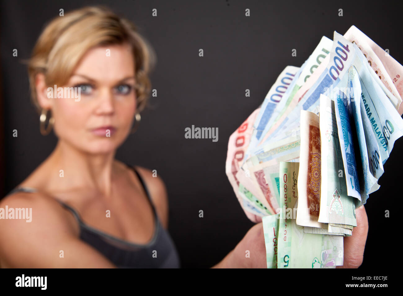 cute girl holding a lot of bank notes Stock Photo - Alamy