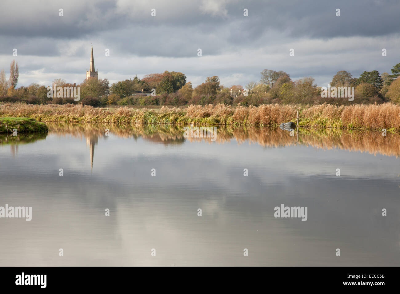 The spire of St Lawrence Church in Lechlade on Thames reflected in the ...