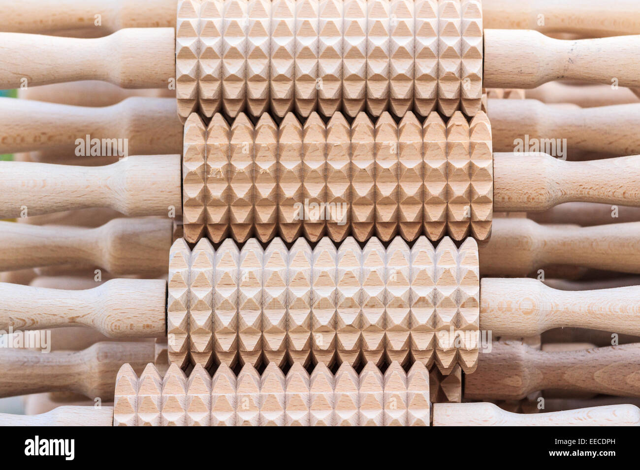 A set of wooden bohemian rolling pins with spikes Stock Photo - Alamy
