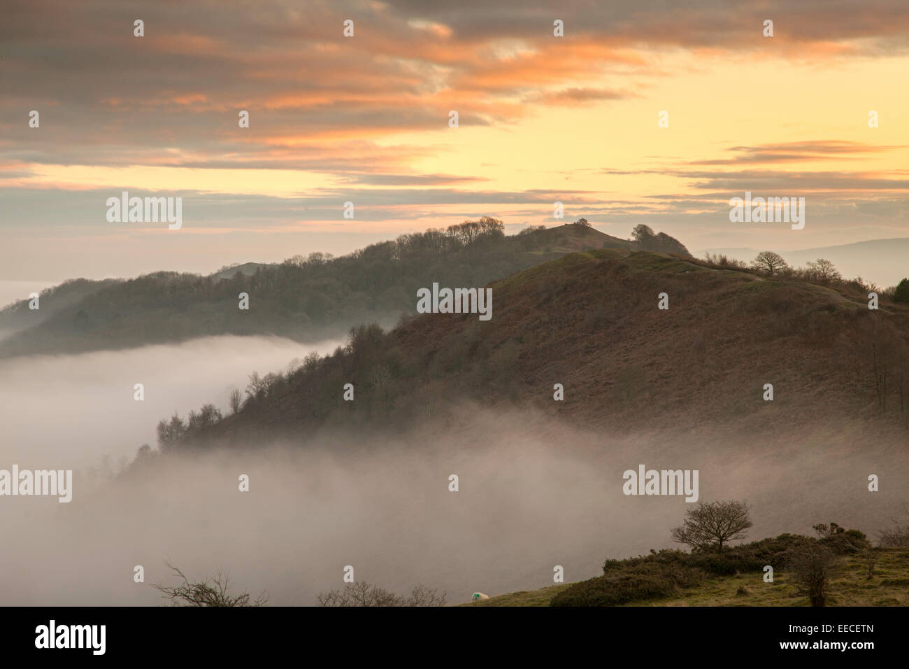 Misty sunset on Hangman hill looking towards Midsummer hill, Malvern ...