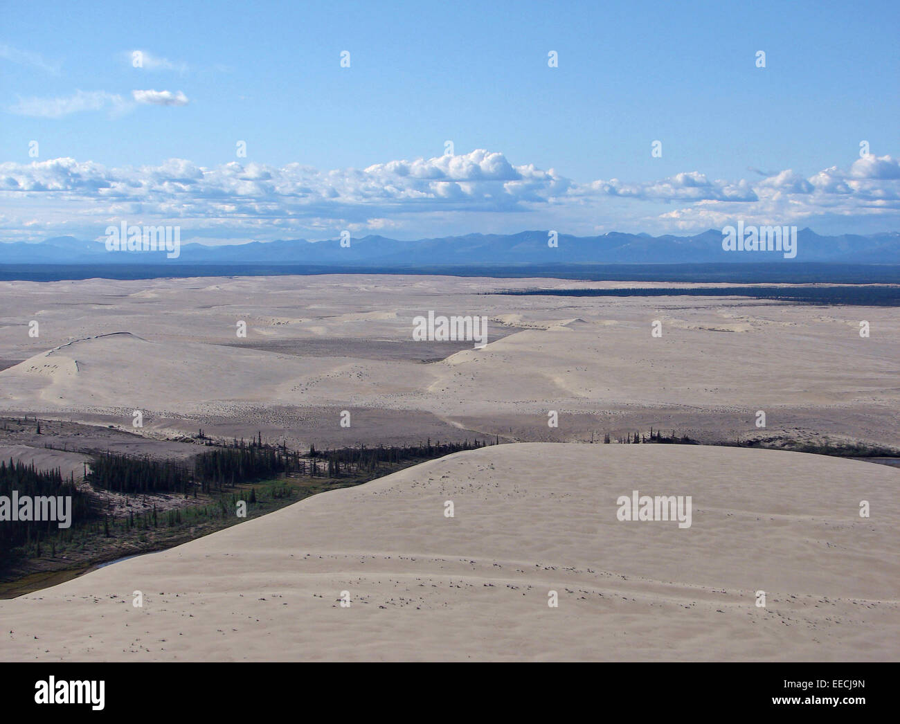 Aerial view of the Great Kobuk Sand Dunes with the Baird Mountains in ...