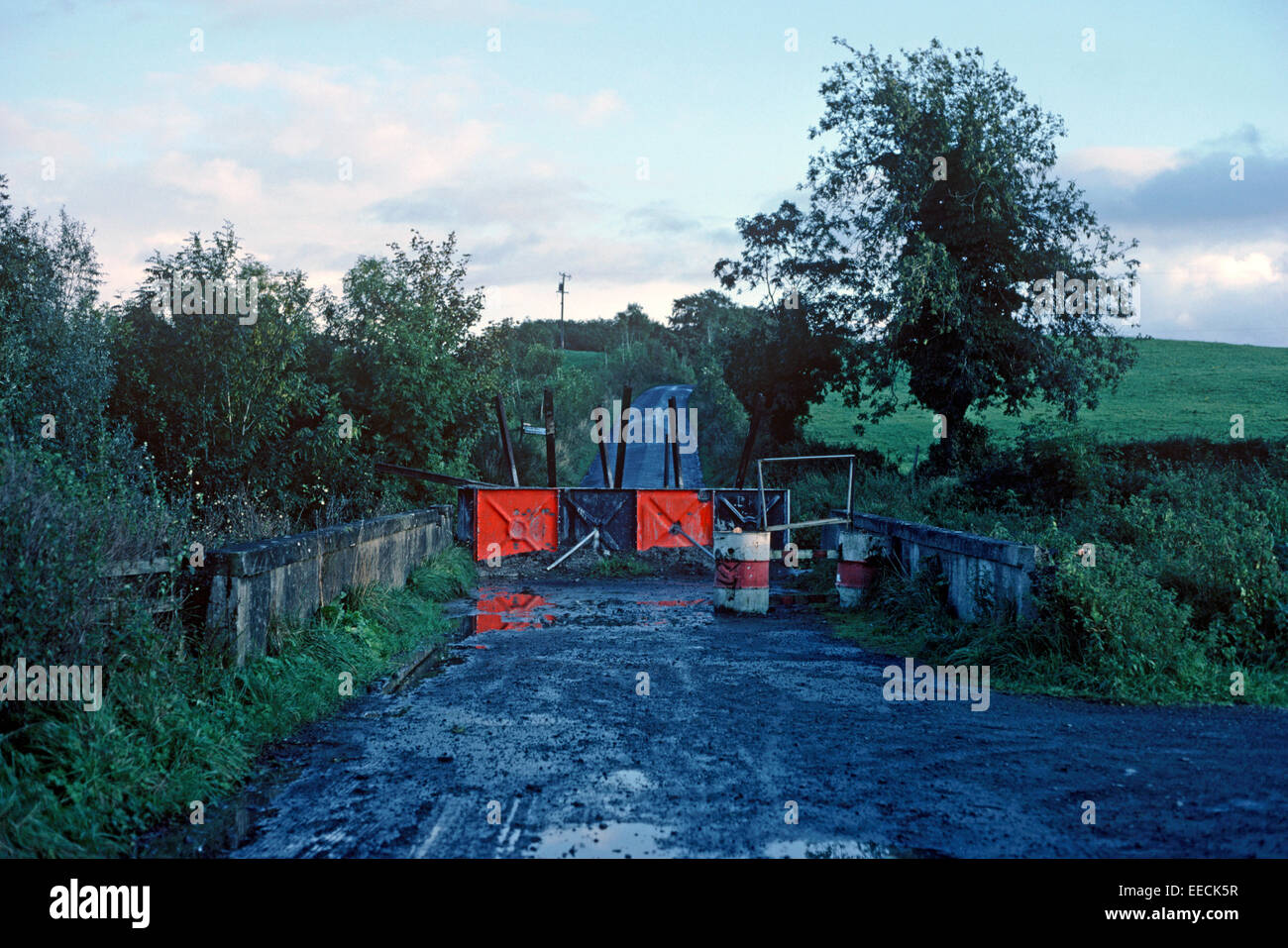COUNTY FERMANAGH, NORTHERN IRELAND - OCTOBER 1980. cross border road ...