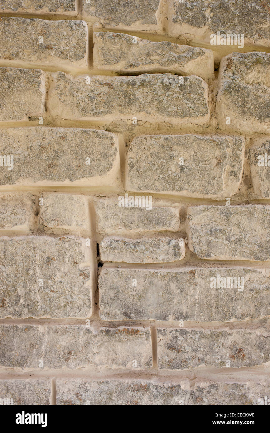 Re-pointing a Cotswolds stone wall using traditional mortaring method ...