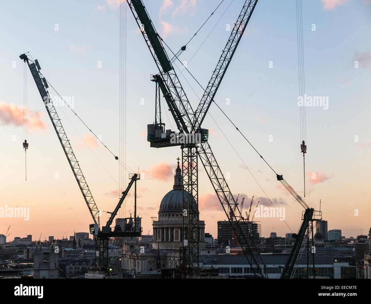 Tower cranes on the Bloomberg building site in the City of London EC4 ...
