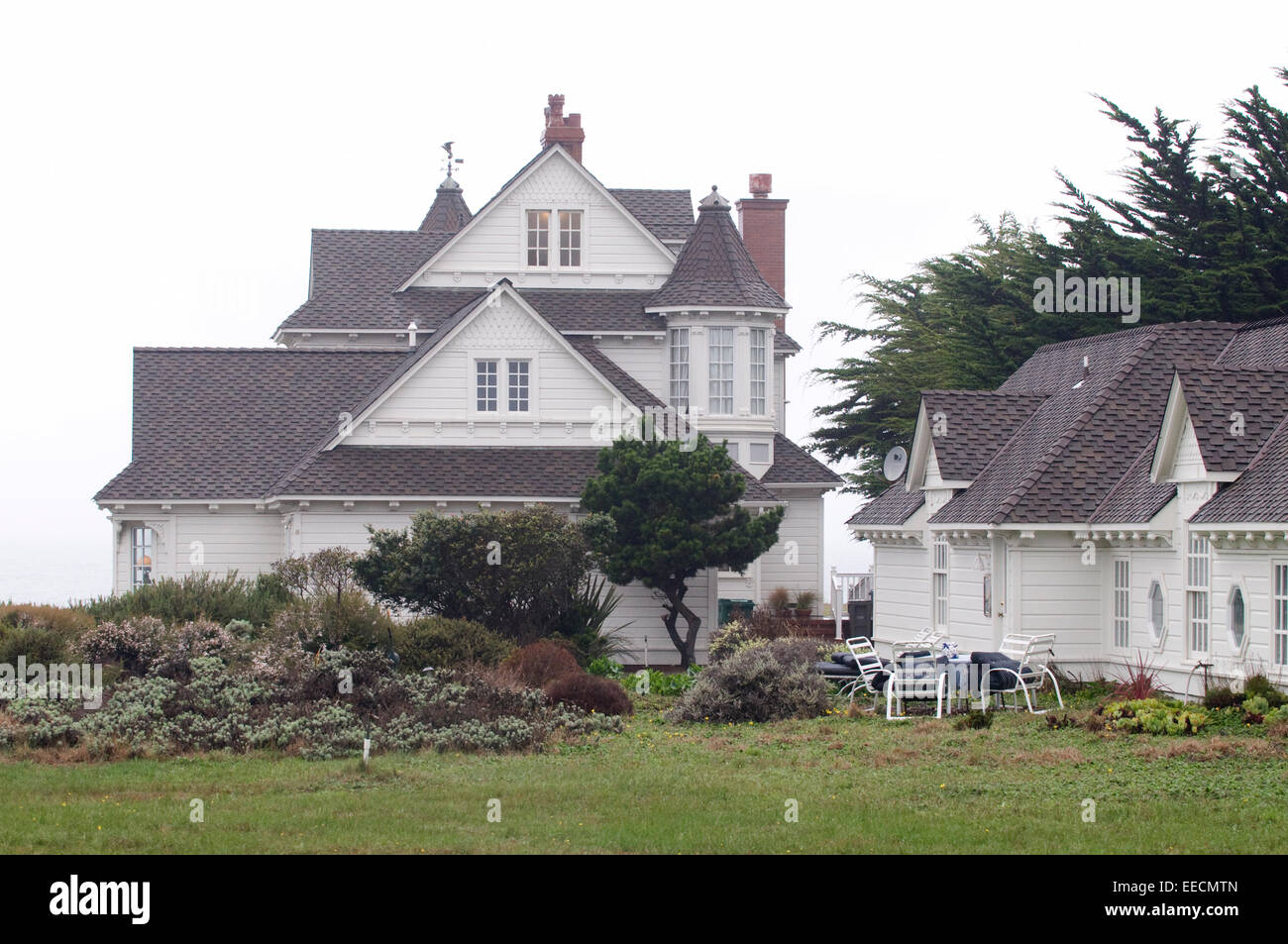 Coastal white painted wood and tiled colonial architecture house Jug ...