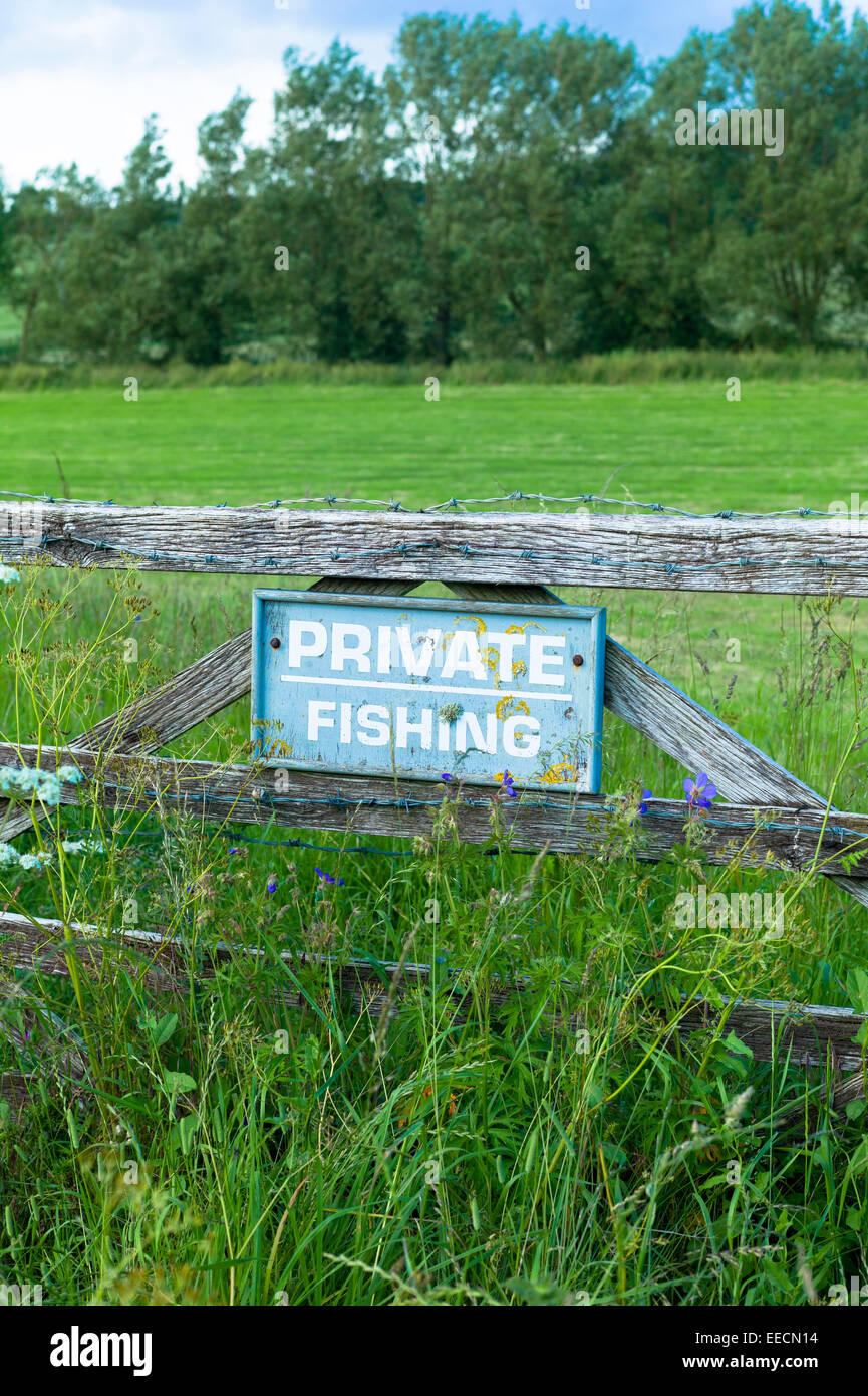 Private fishing sign on five-bar gate to a field in The Cotswolds ...
