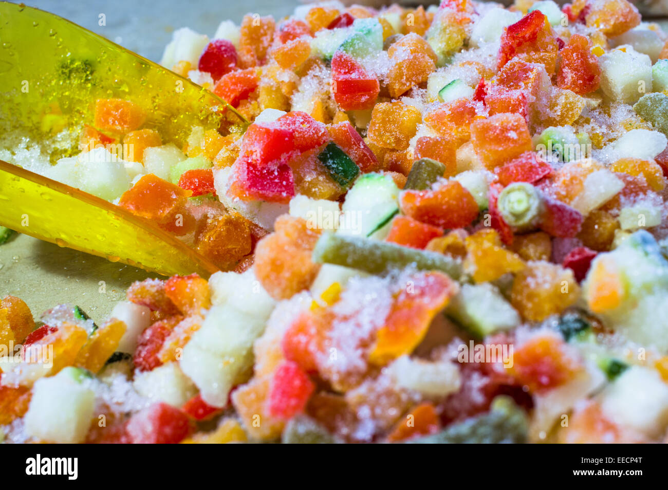 Frozen vegetables closeup colorful in hoarfrost. Packaging scoop Stock ...
