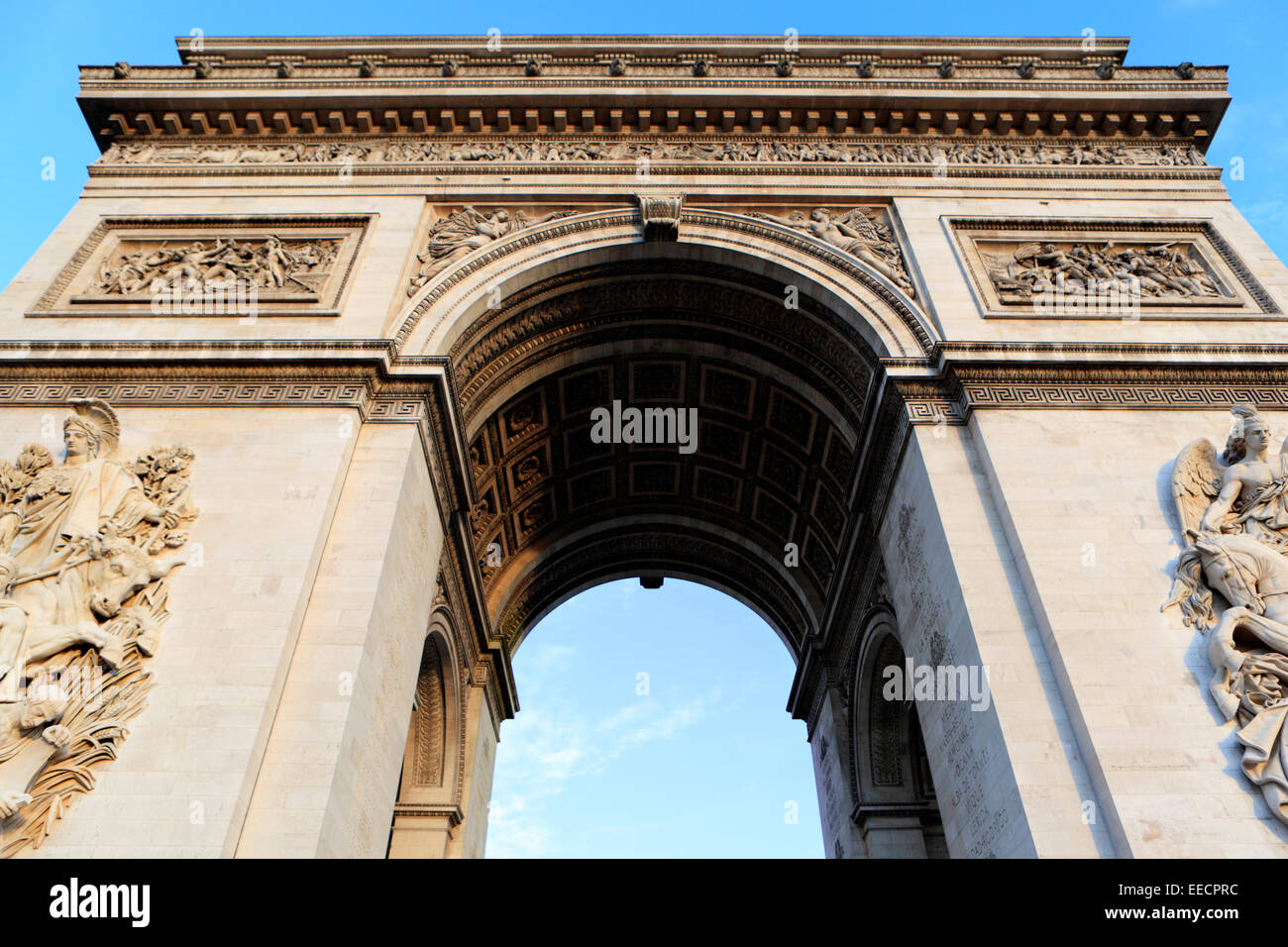 Extreme low angle view of the famous Arc de Triomphe in Paris, France ...