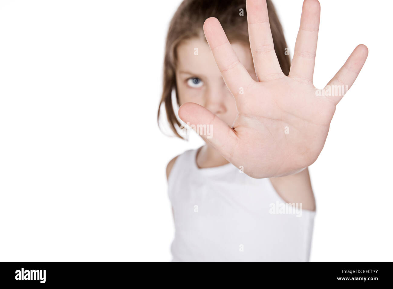Shot of a Cute LIttle Girl Hiding Behind her Hand Stock Photo - Alamy