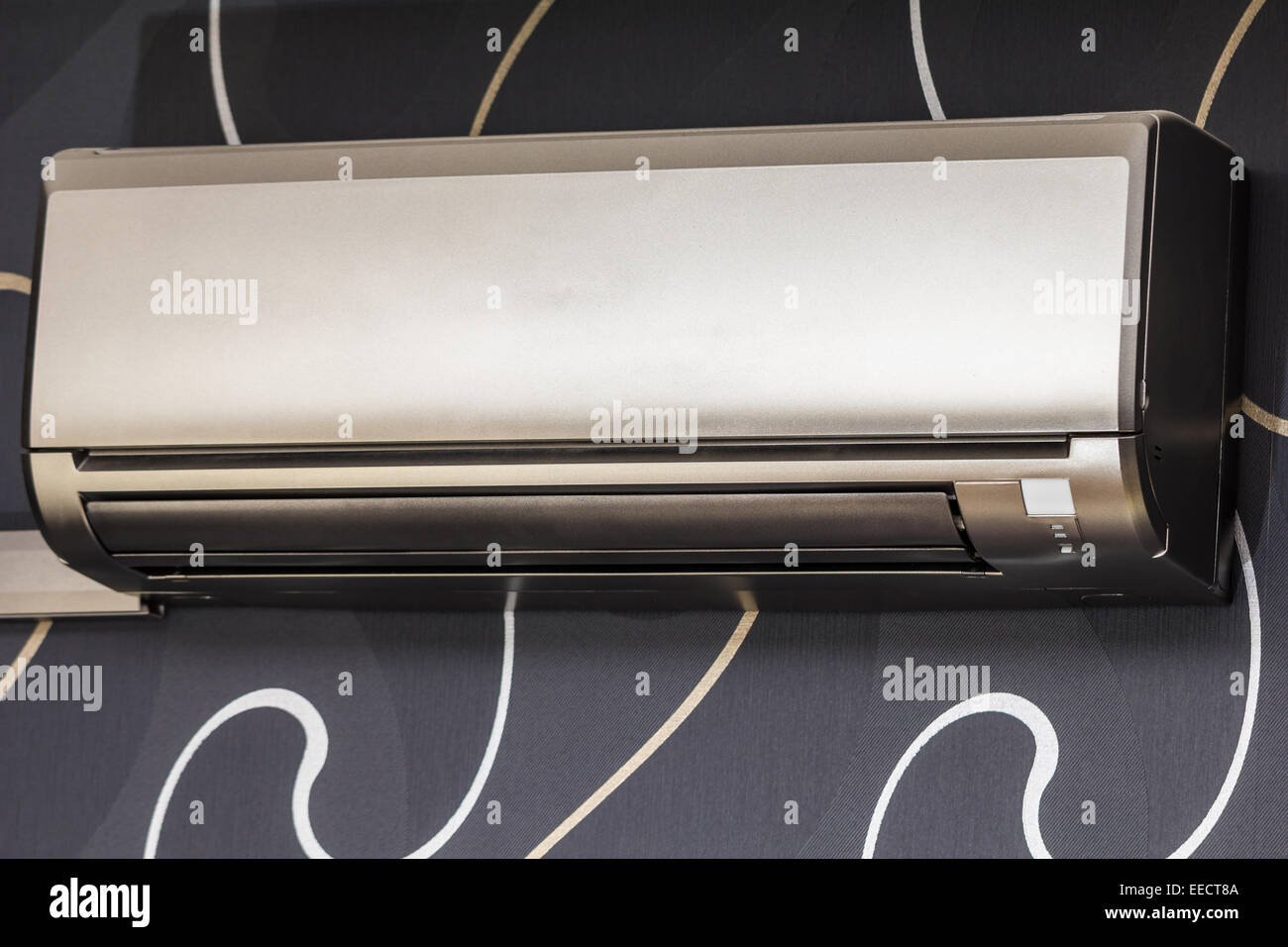 Air conditioning on designer wallpaper Stock Photo - Alamy