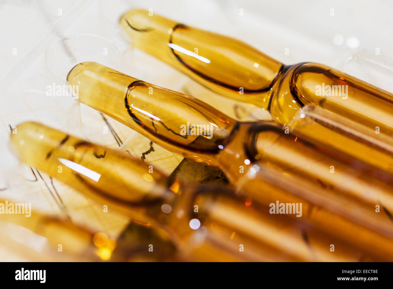 Phials. Ampoule, ampullar glass brown with cardiogram background Stock ...