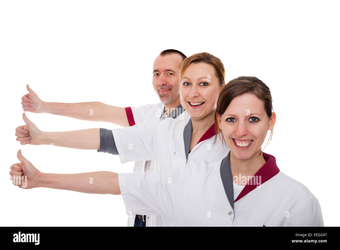 three nurses demonstrate teamwork and success isolated on white Stock ...