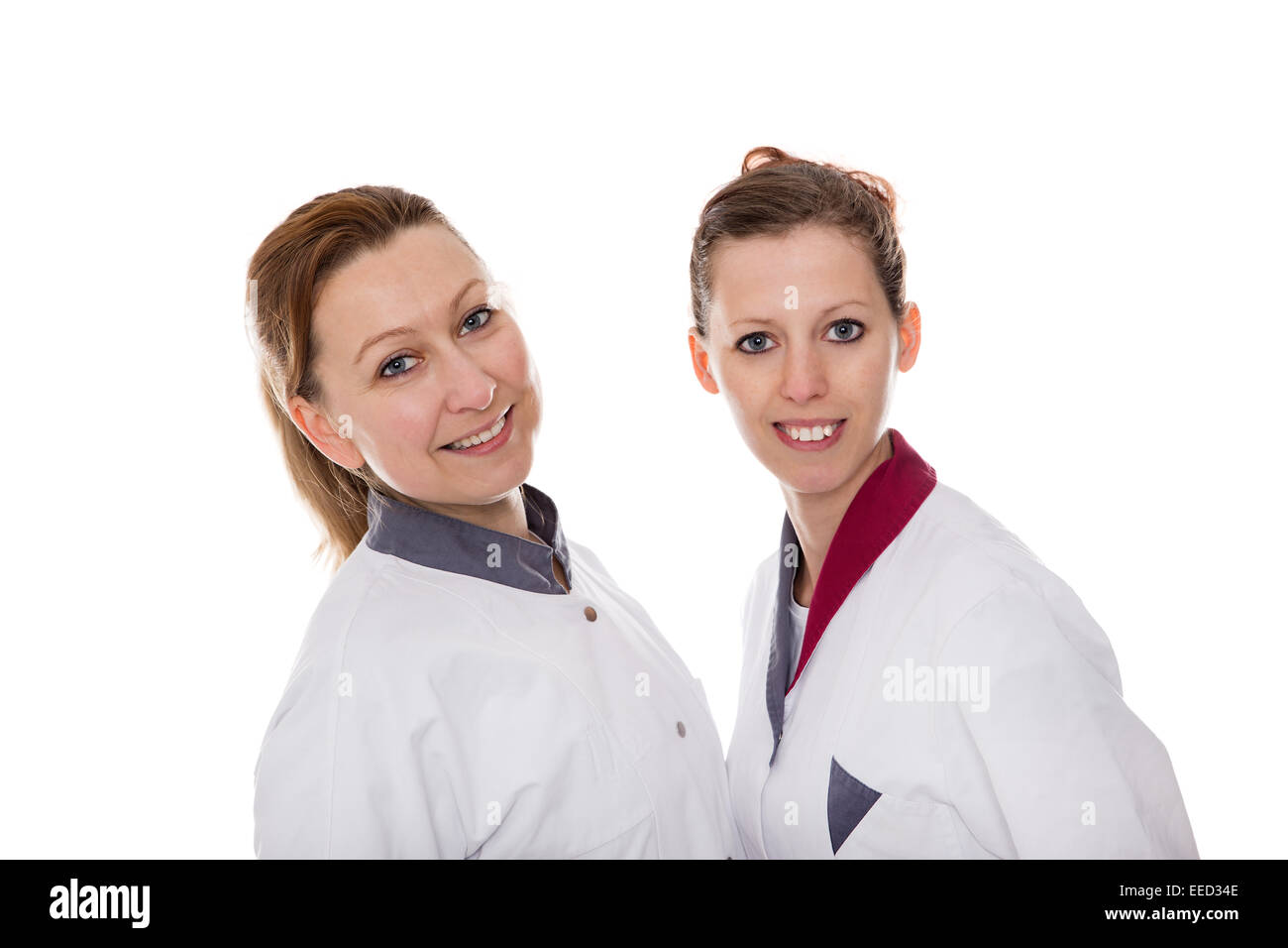 Two female nurses smiling viewer hi-res stock photography and images ...