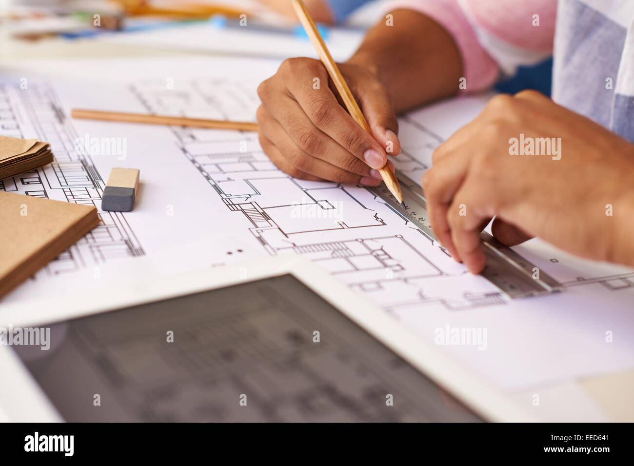 Hands of male architect making sketch Stock Photo - Alamy