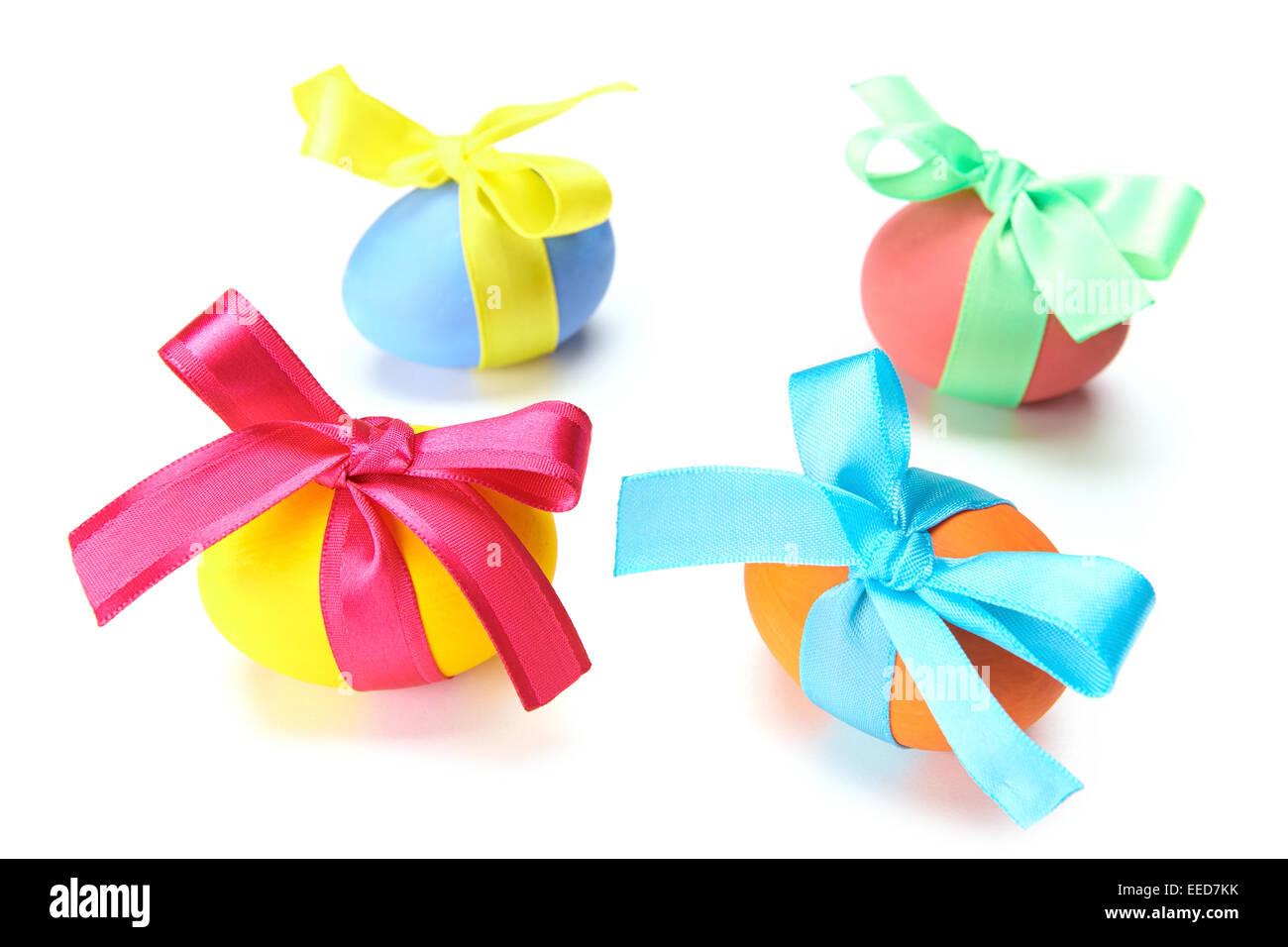 Group of Easter eggs tied up by silk ribbons Stock Photo - Alamy