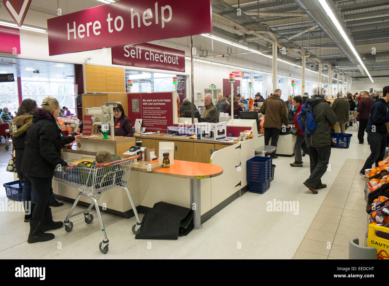 Checkout tills and Here to Help desk at a Sainsbury's supermarket store ...