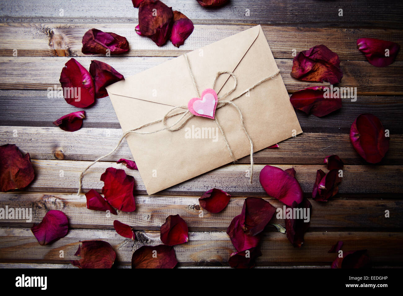 Letter of congratulations sealed by small decorative heart on its top ...