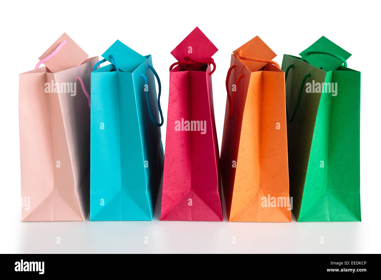 Colorful shopping bags in a row Stock Photo - Alamy