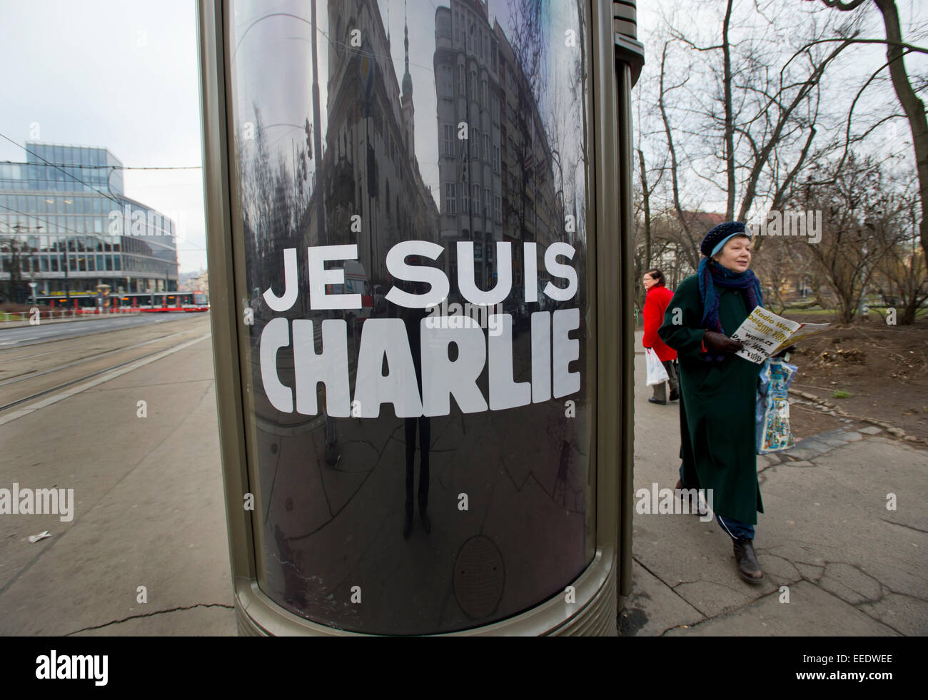 At advertising columns and billboards are black posters with slogan "Je ...