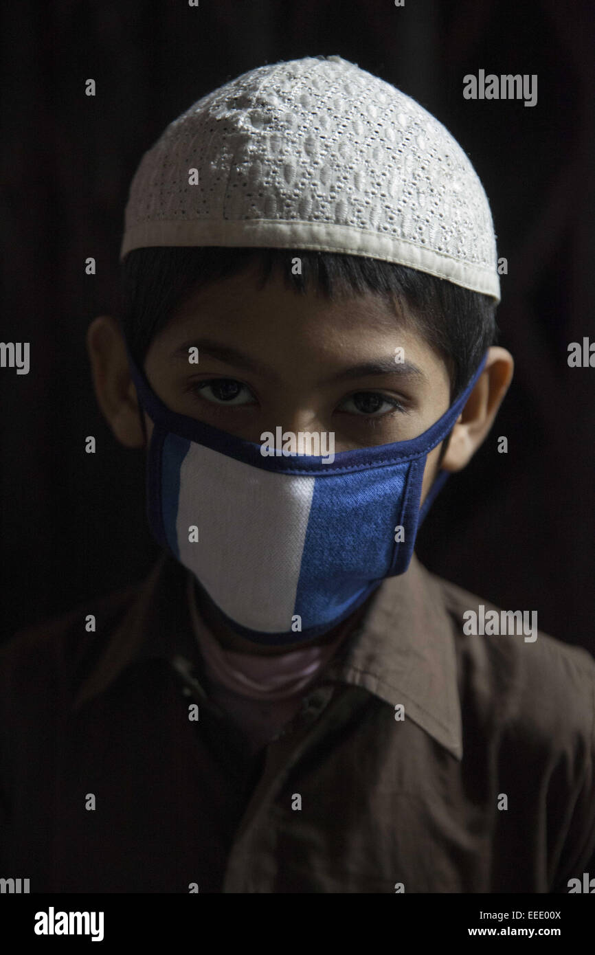Dhaka, Bangladesh. 16th Jan, 2015. A Muslim child attended to offer ...