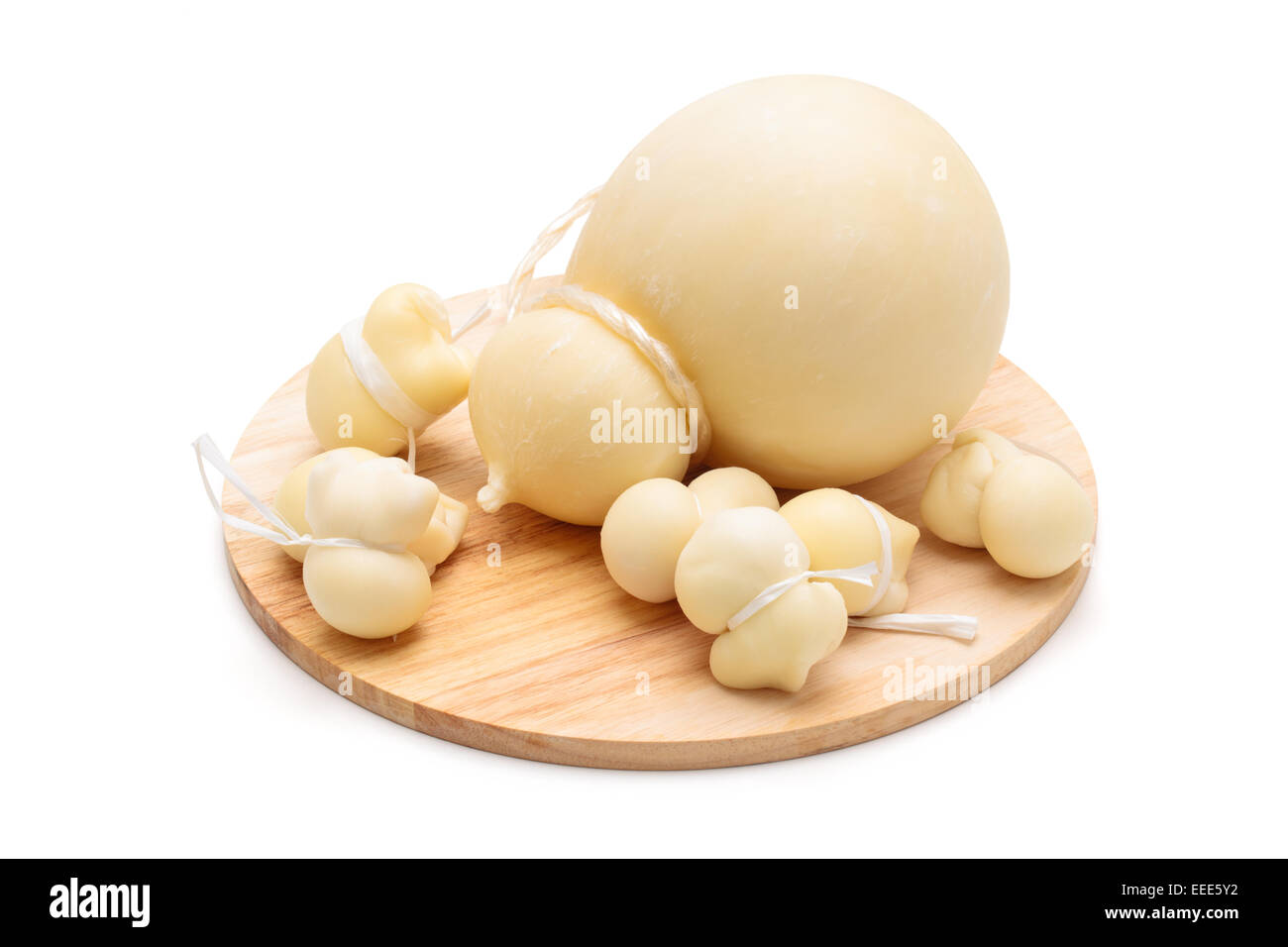 Italian dried mozzarella on cutting board Stock Photo - Alamy