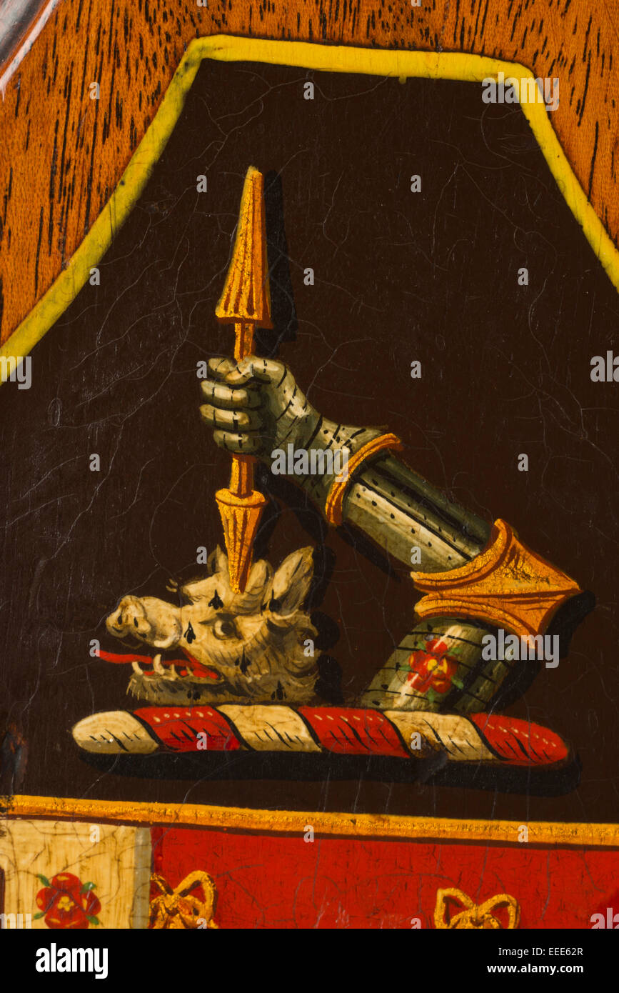 Hand painted family crest. An armoured arm with lance and Boars head ...