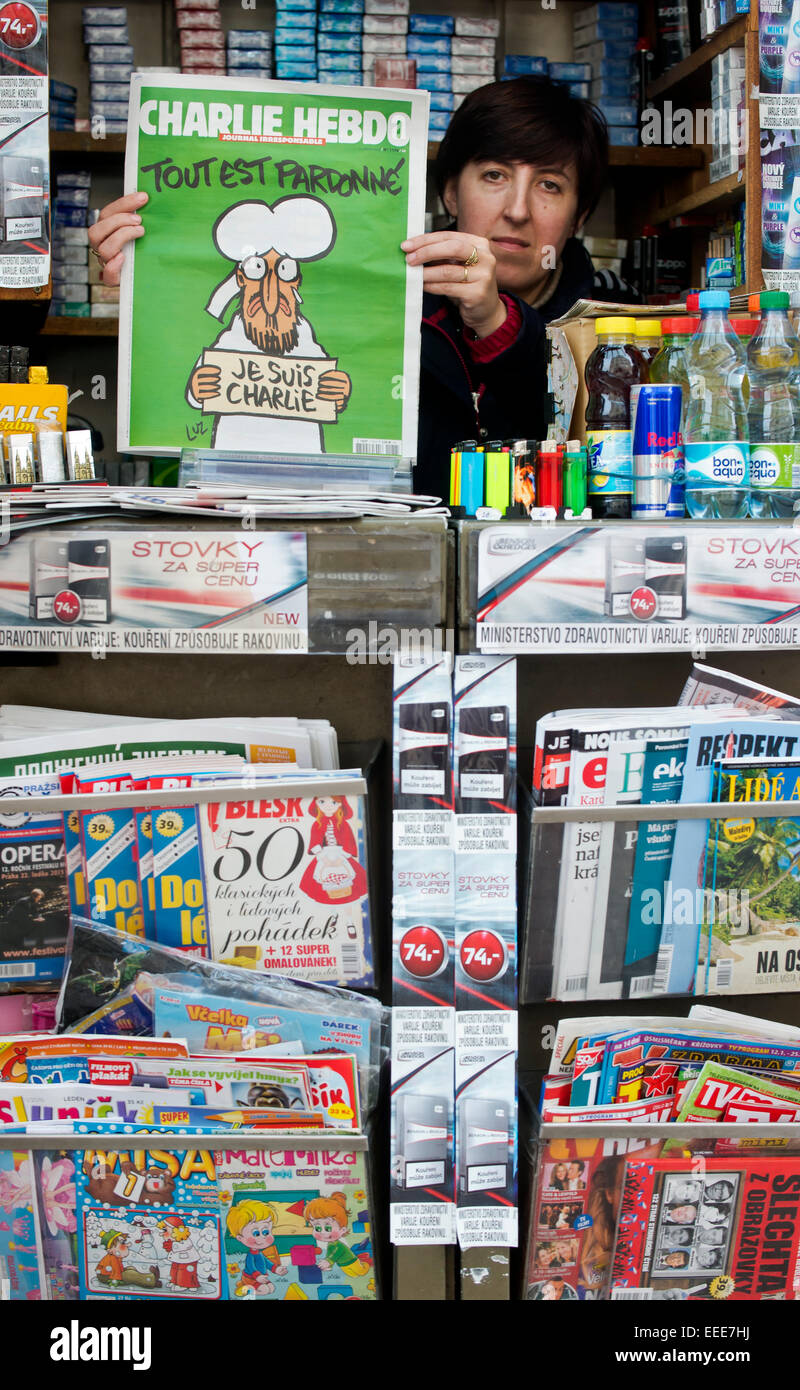 Woman shows the Charlie Hebdo magazine at the Wenceslas Square, Prague ...