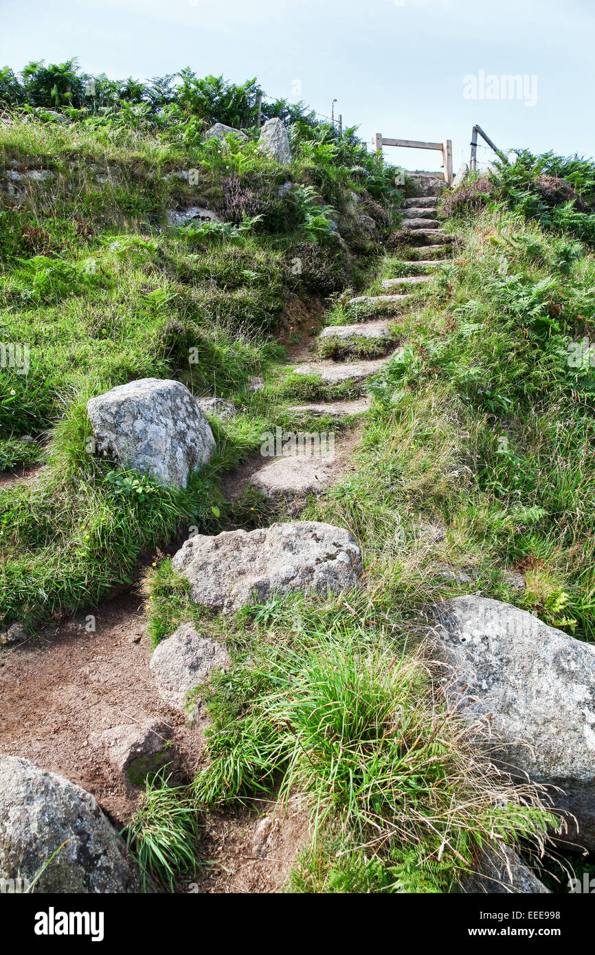 Granite stone steps on the South west Coast path at Tregerthen Cliffs ...