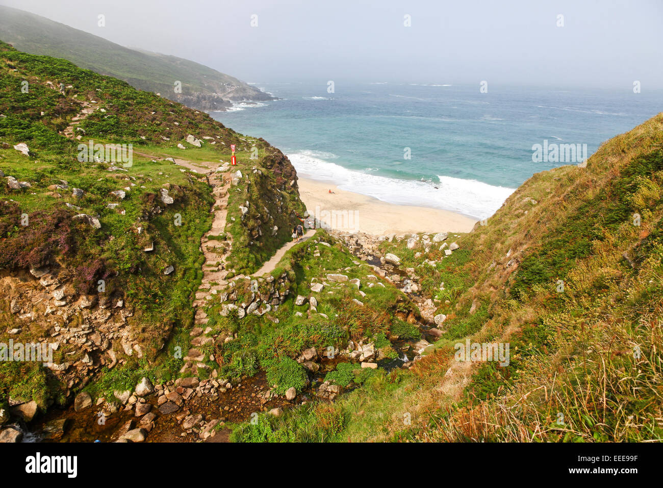 The steps, stream and beach at Portheras Cove Cornwall England UK Stock ...