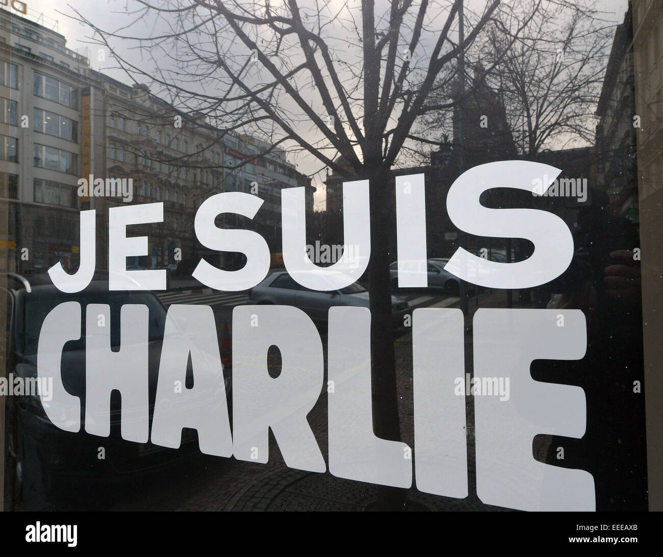 At advertising columns and billboards are black posters with slogan "Je ...