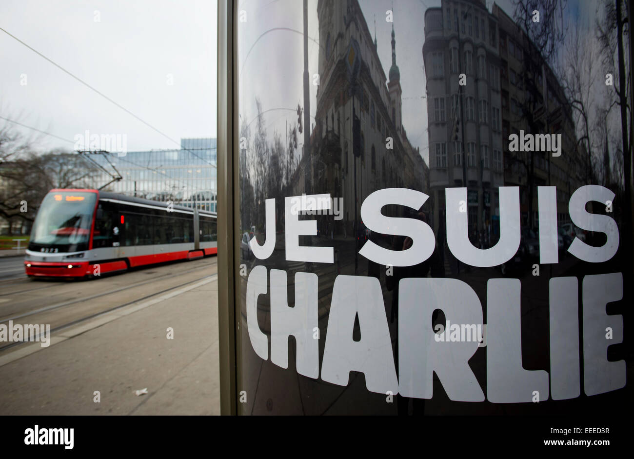 At advertising columns and billboards are black posters with slogan "Je ...