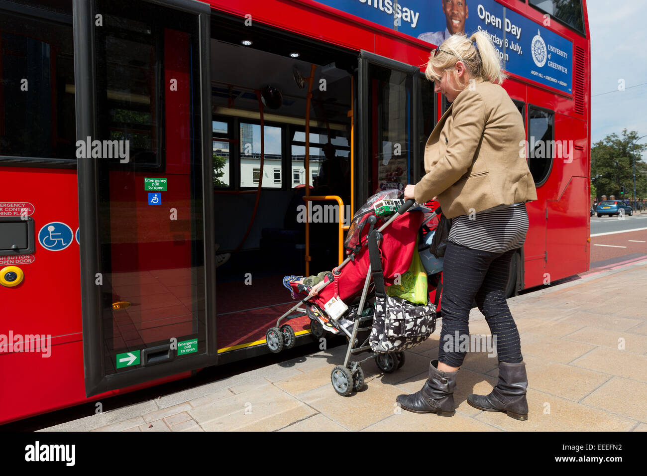 Woman boarding a London bus with a baby buggey Stock Photo - Alamy