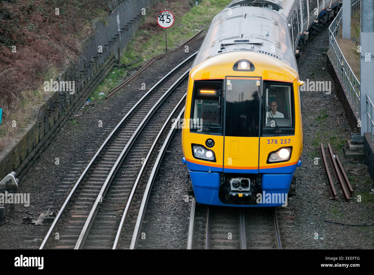 Front of a London Overground train on the tracks Stock Photo - Alamy