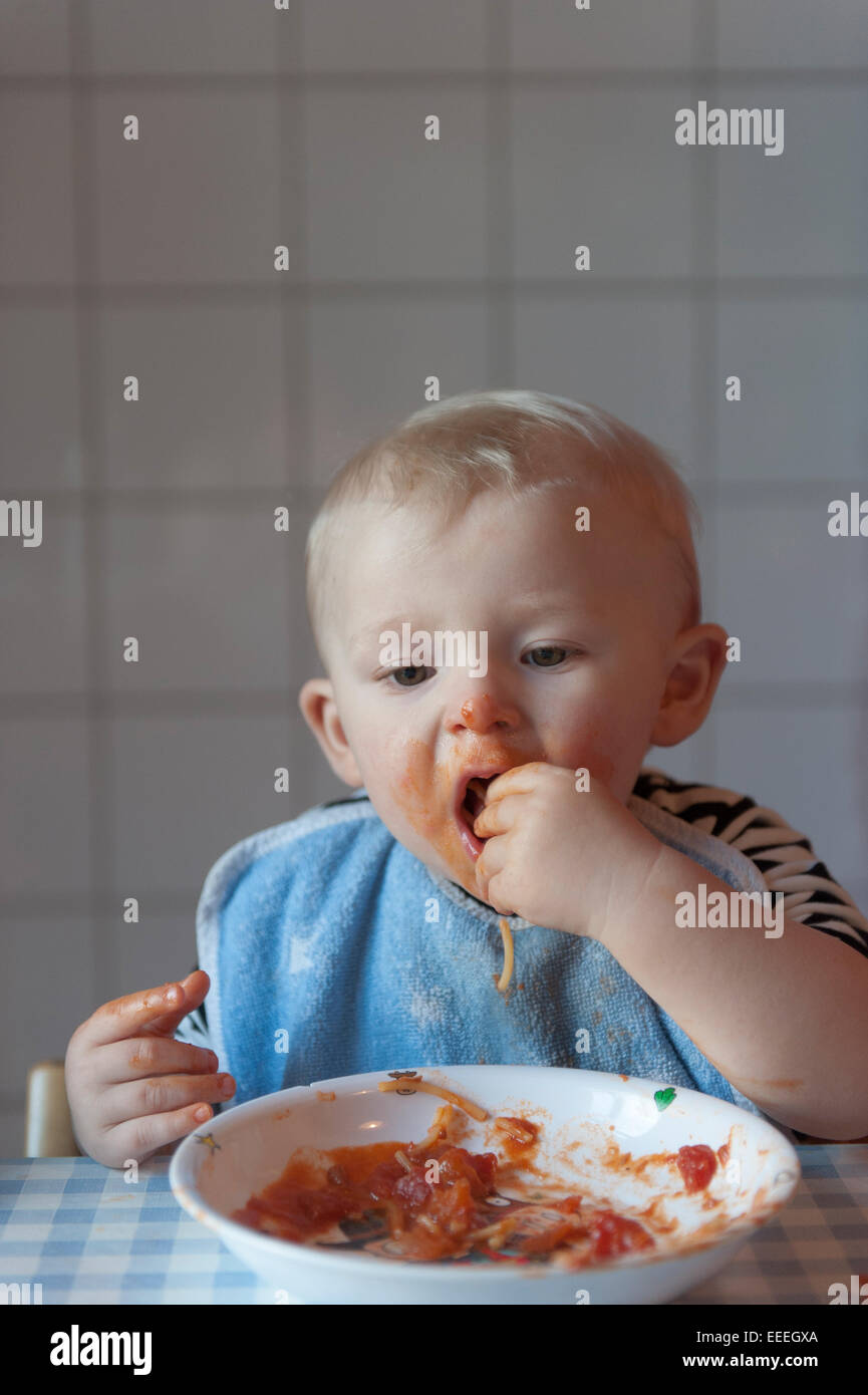 Freiburg, Germany, little kid eating Stock Photo - Alamy