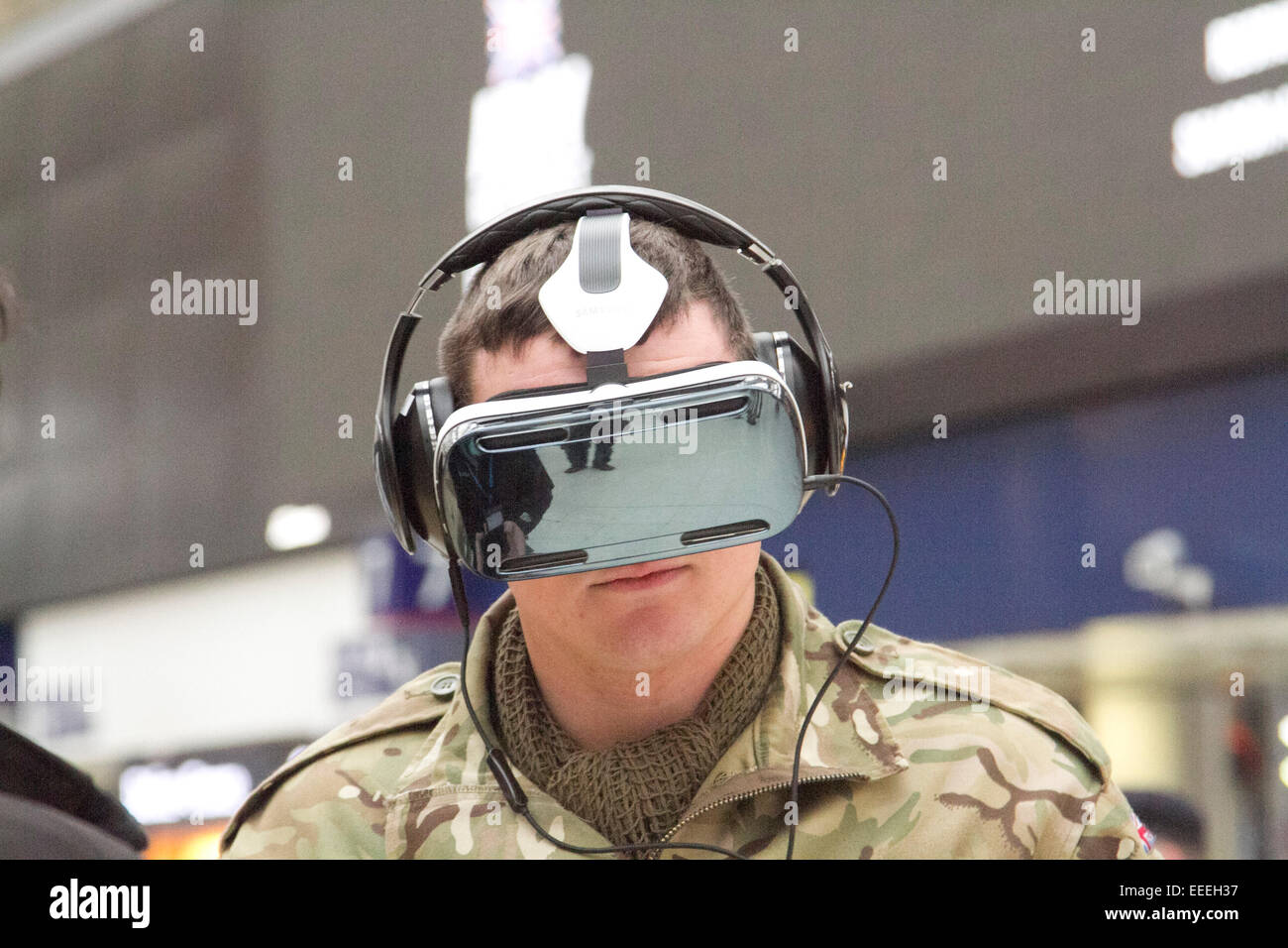 London, UK. 16th January 2015. A soldier wearing virtual reality ...