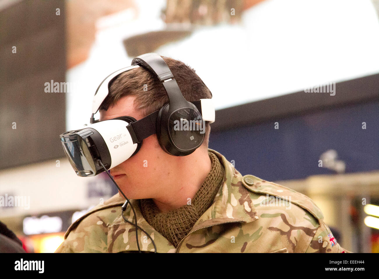 London, UK. 16th January 2015. A soldier wearing virtual reality ...