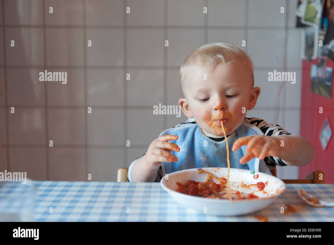 Freiburg, Germany, little kid eating Stock Photo - Alamy