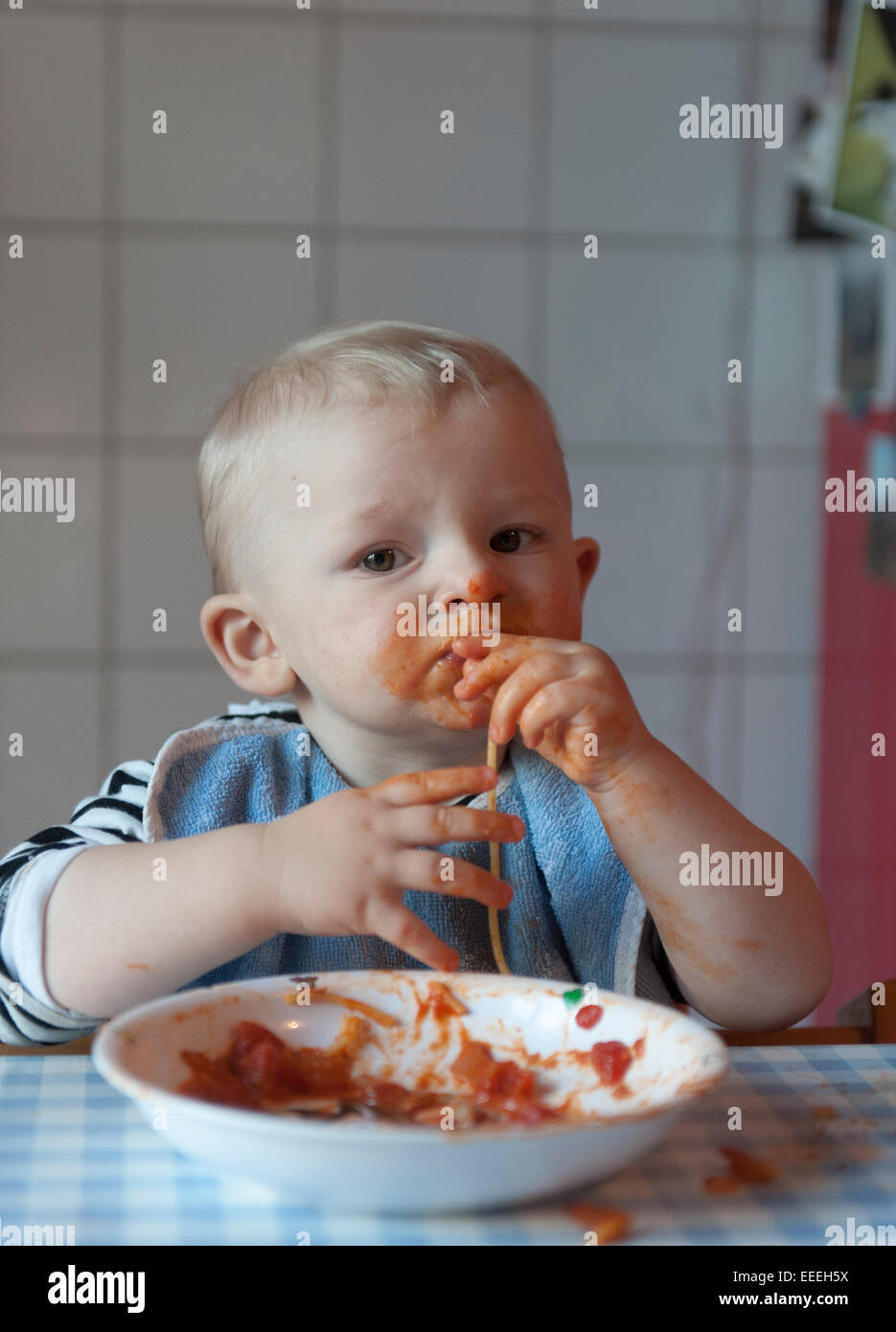 Freiburg, Germany, little kid eating Stock Photo - Alamy