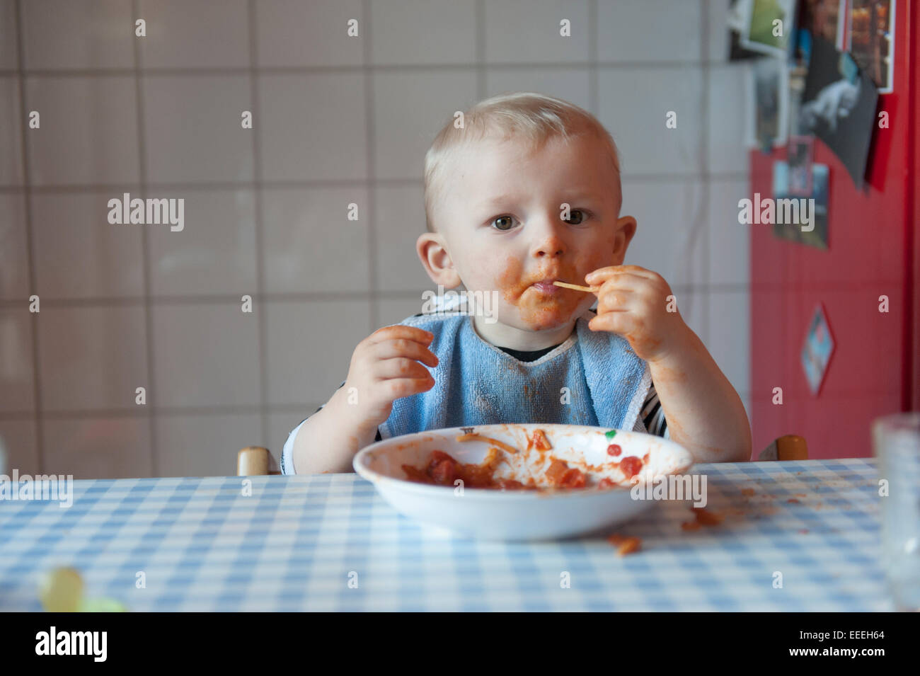 Freiburg, Germany, little kid eating Stock Photo - Alamy